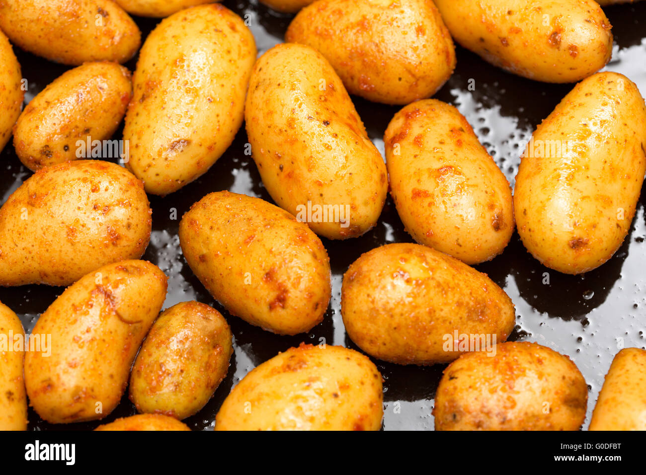 Oiled Potatoes High Resolution Stock Photography and Images - Alamy