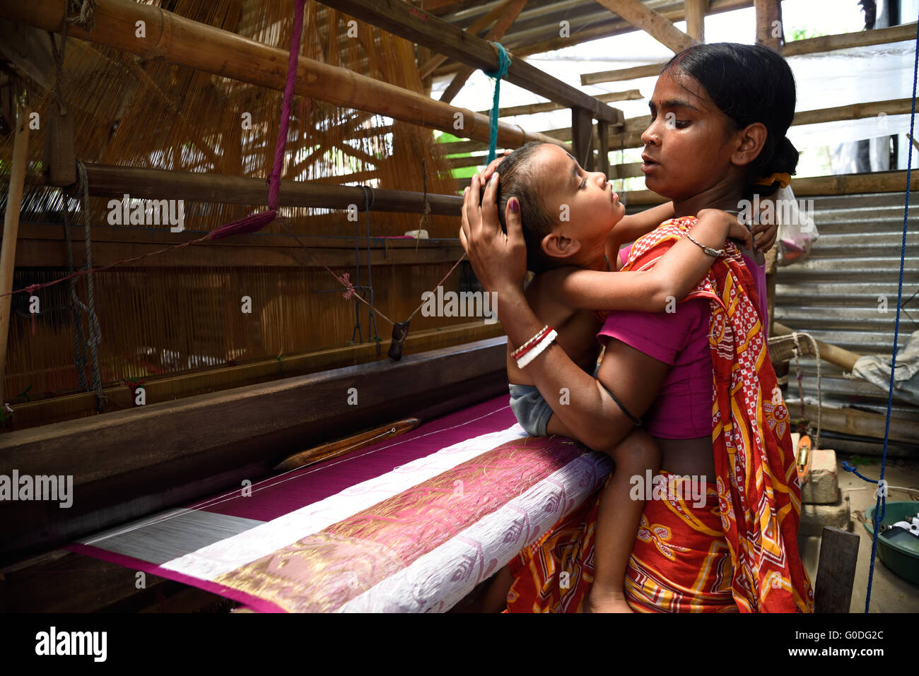Woman Weaving on a Loom Stock Photo - Alamy