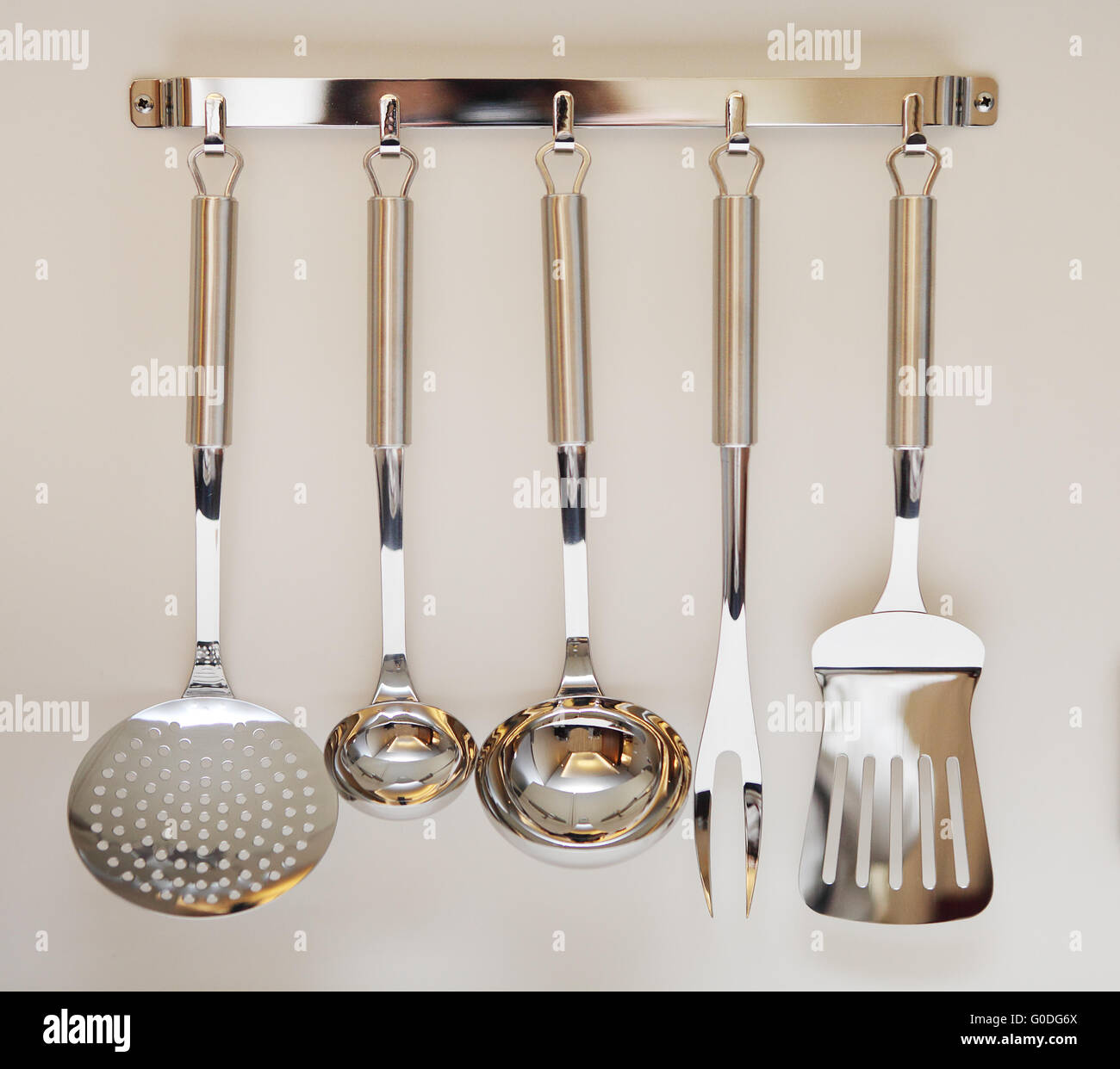 Set of black modern kitchen utensil hanging Stock Photo - Alamy