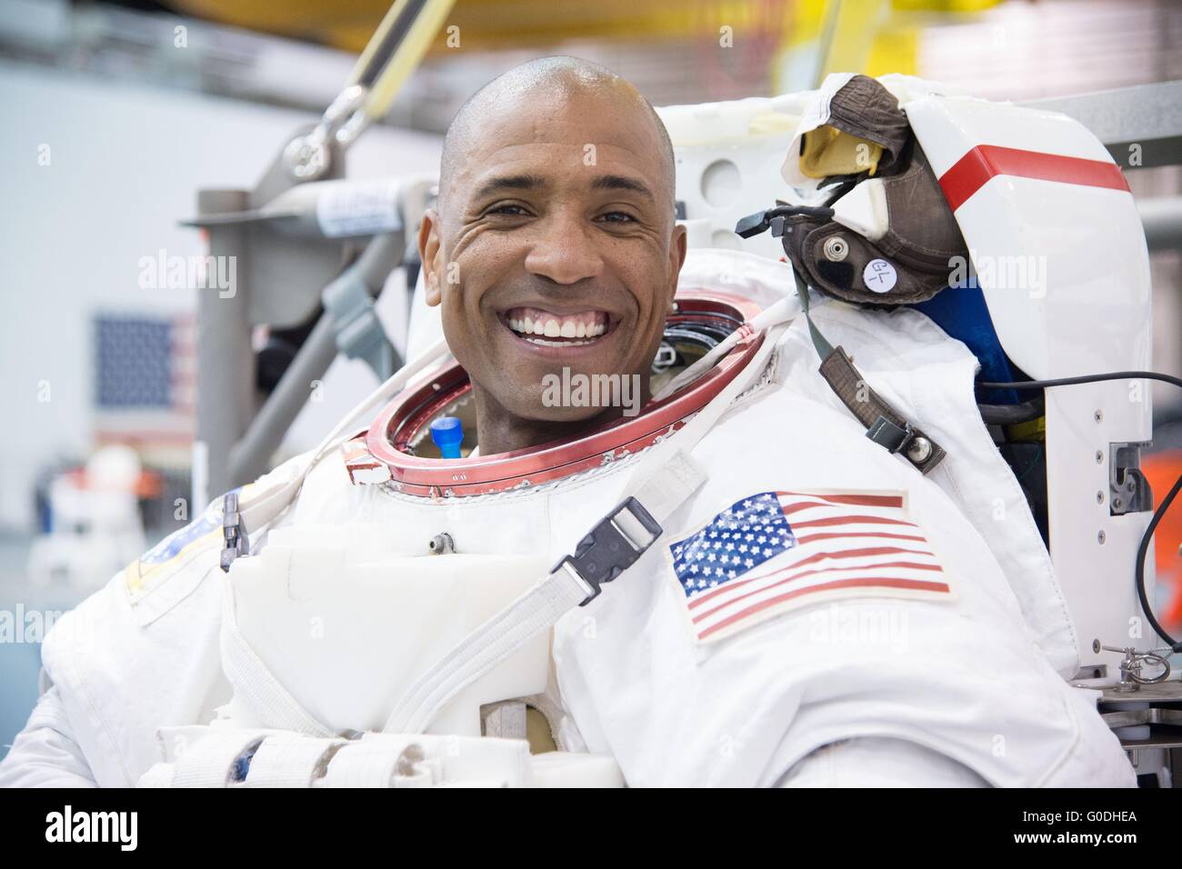 NASA astronaut Victor Glover before descending into the pool in his ...