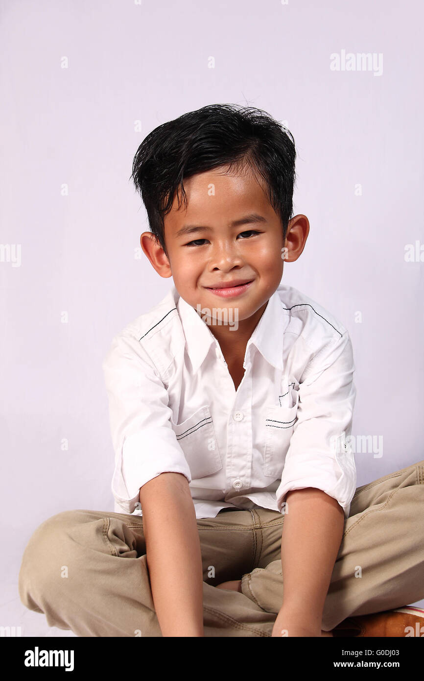 Asian boy smiling hi-res stock photography and images - Alamy