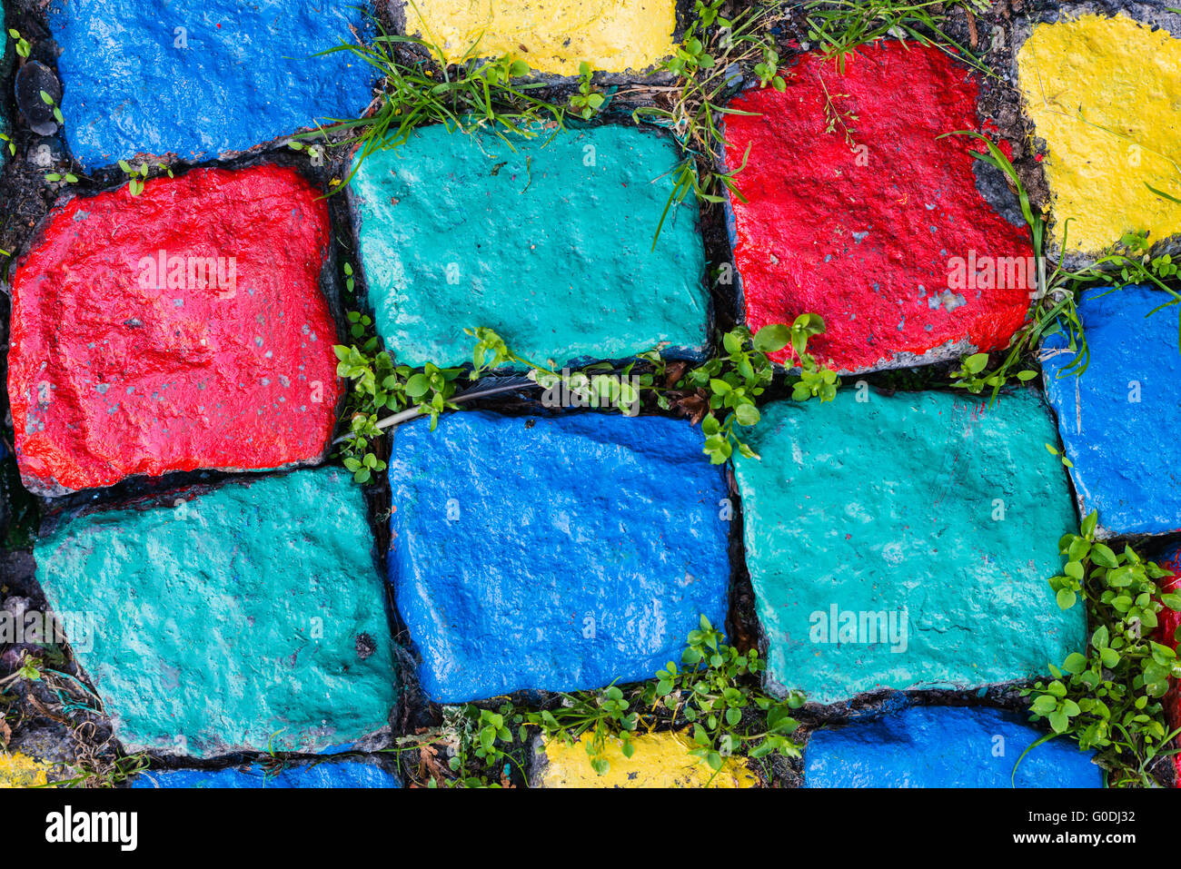 Colourful painted stone paving texture Stock Photo - Alamy