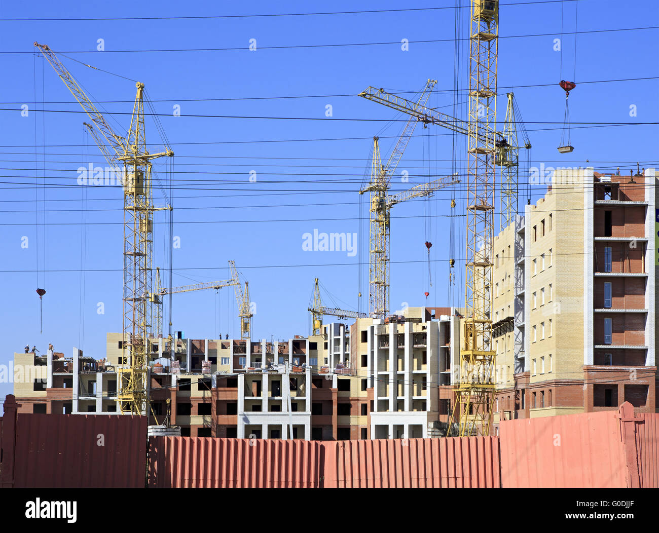 Construction of high-rise apartment brick building Stock Photo - Alamy