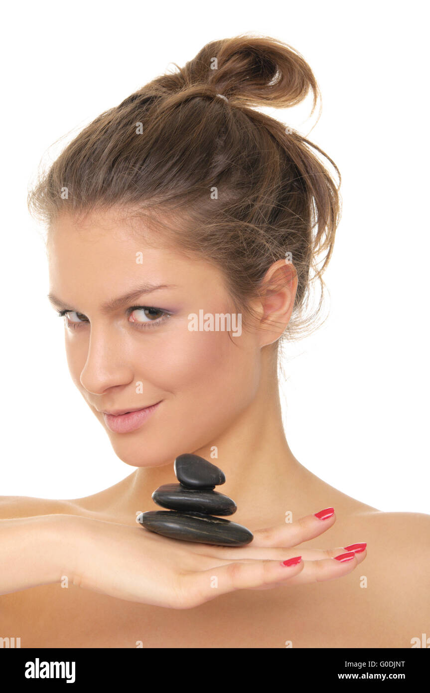 Beautiful woman stacking stones hi-res stock photography and images - Alamy