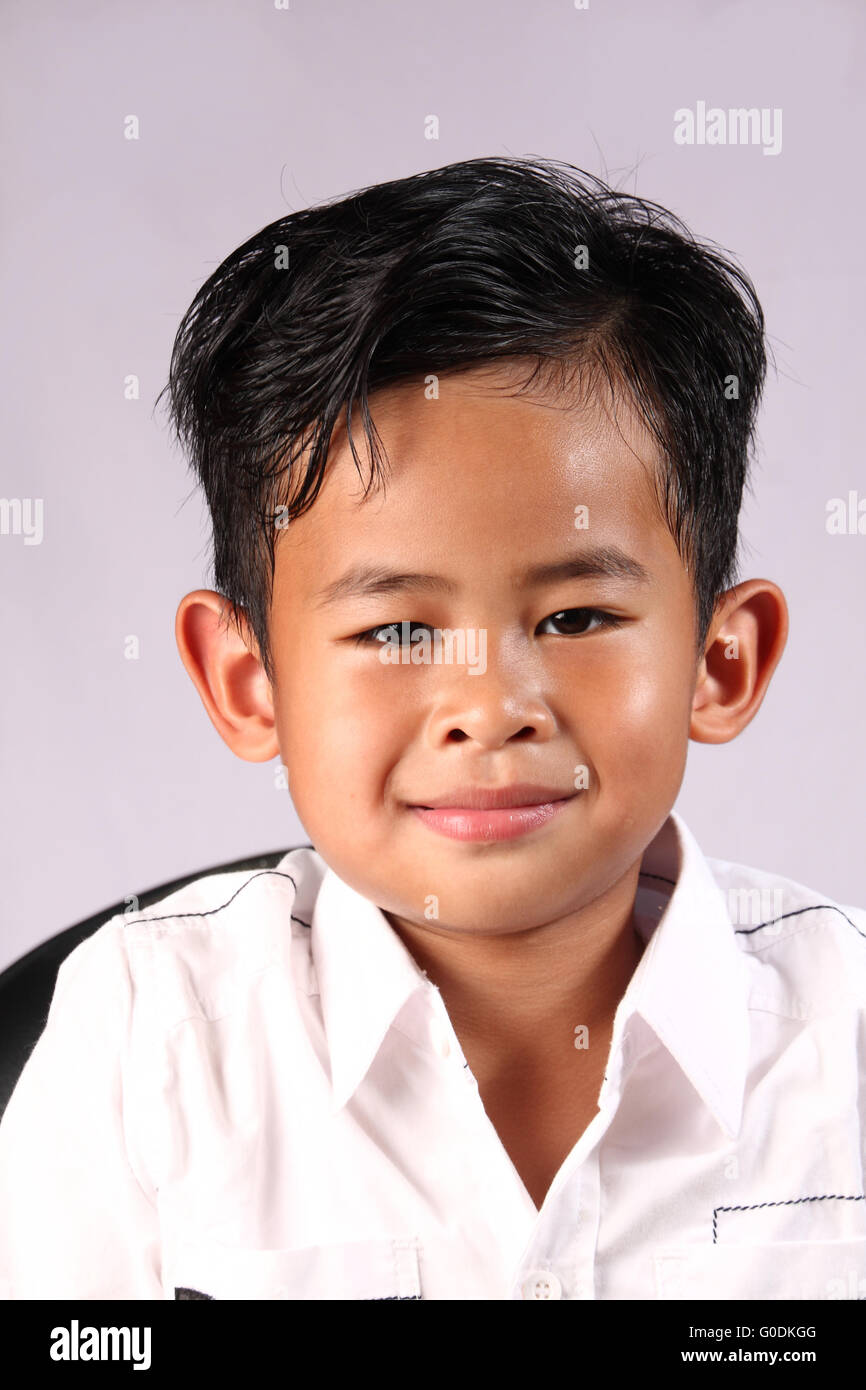 Portrait of happy and smiling Asian boy Stock Photo - Alamy