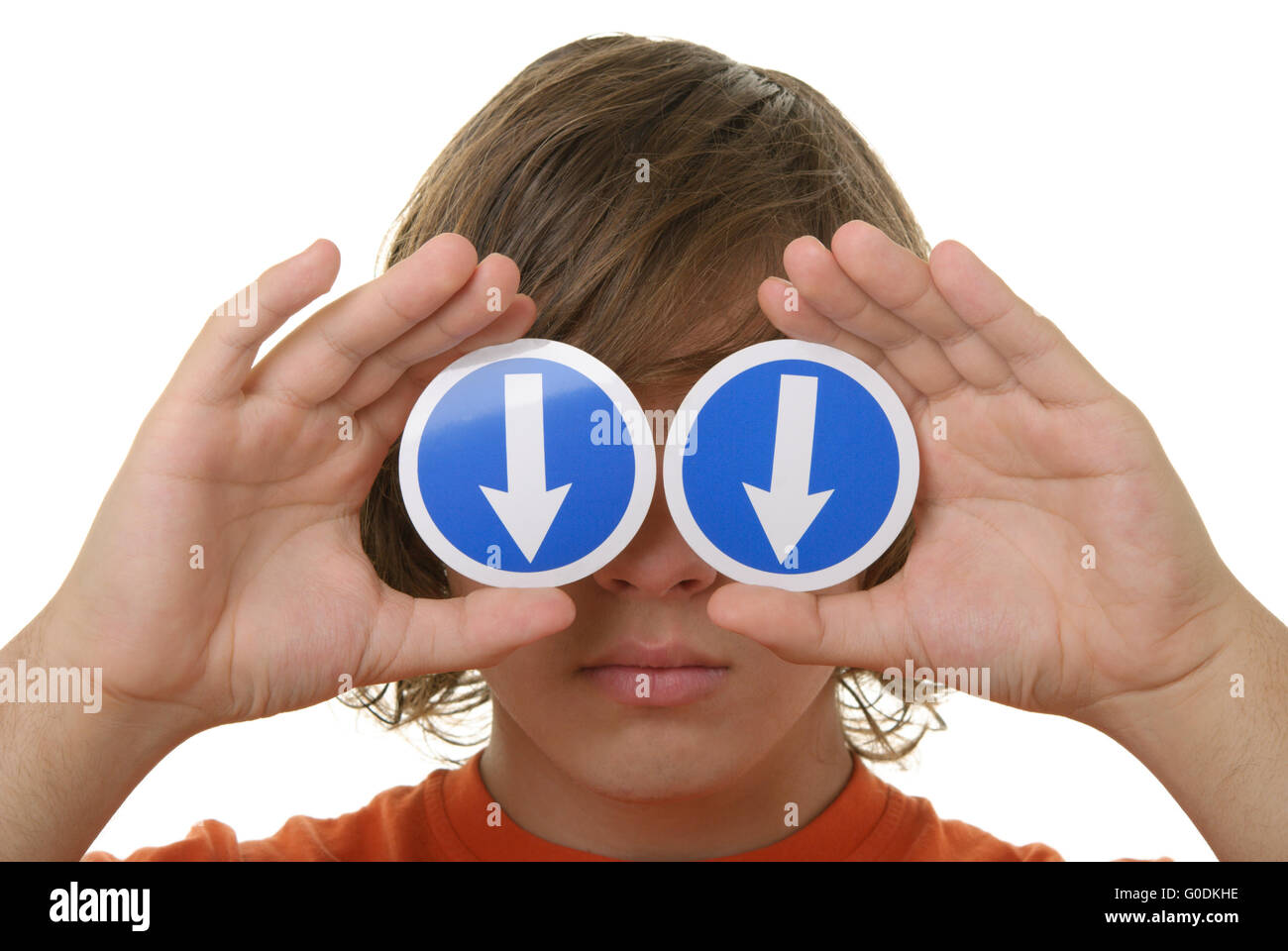 Teenager holds before arrow eyes specifying downwards Stock Photo - Alamy