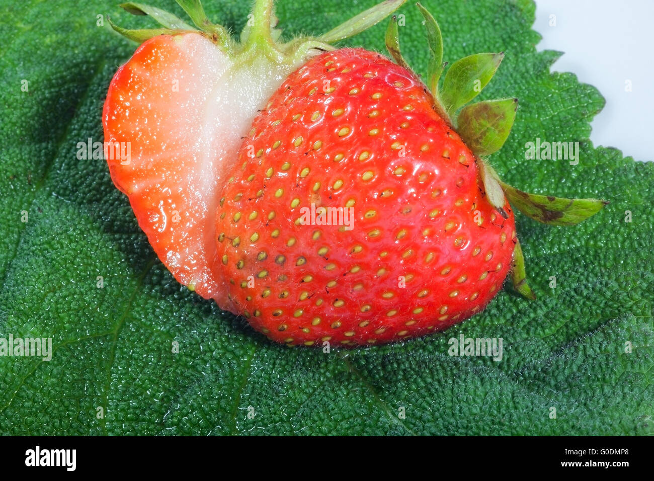 beautiful shape of a red juicy strawberries. macro Stock Photo - Alamy