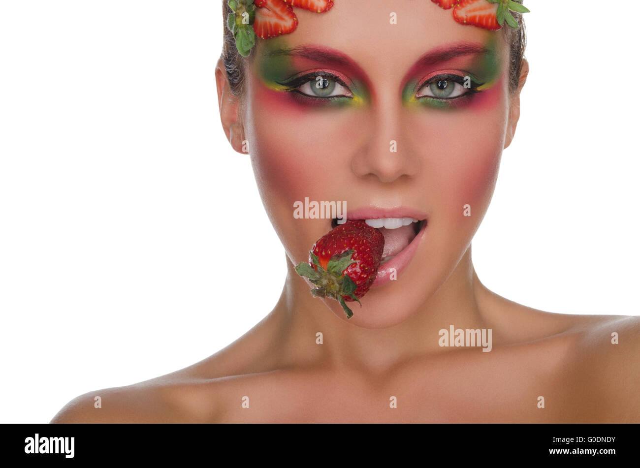 young woman with strawberries on face and teeth Stock Photo - Alamy