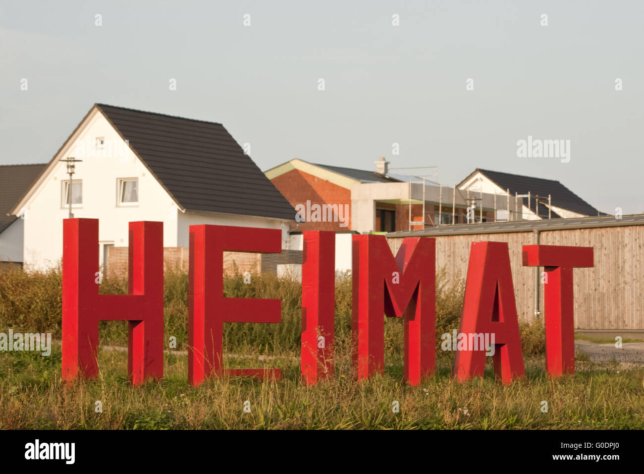 Home Letters in front of Houses Stock Photo - Alamy