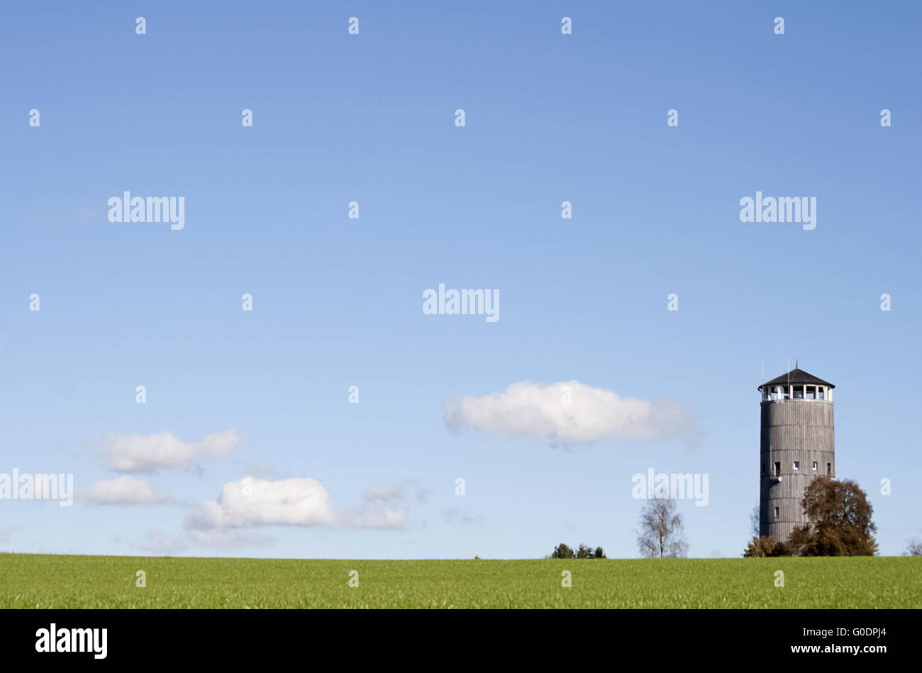 Landscape with water tower Stock Photo - Alamy