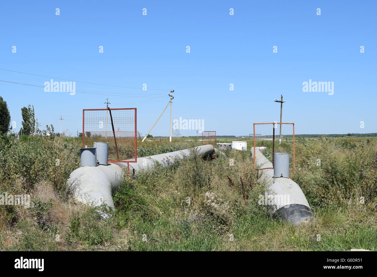 The gas pipeline through the small river Stock Photo - Alamy