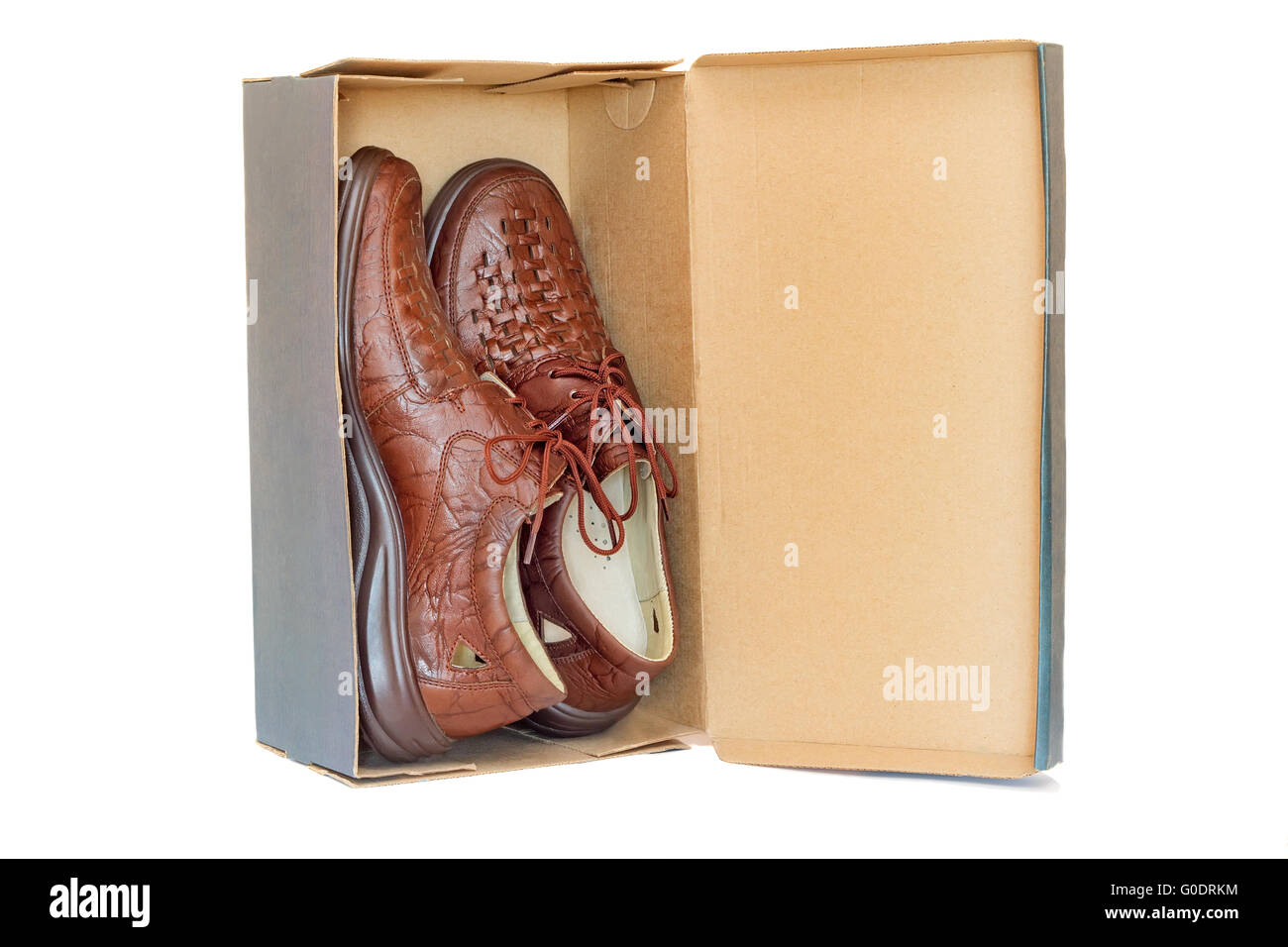 Men's shoes in the package on a white background Stock Photo - Alamy
