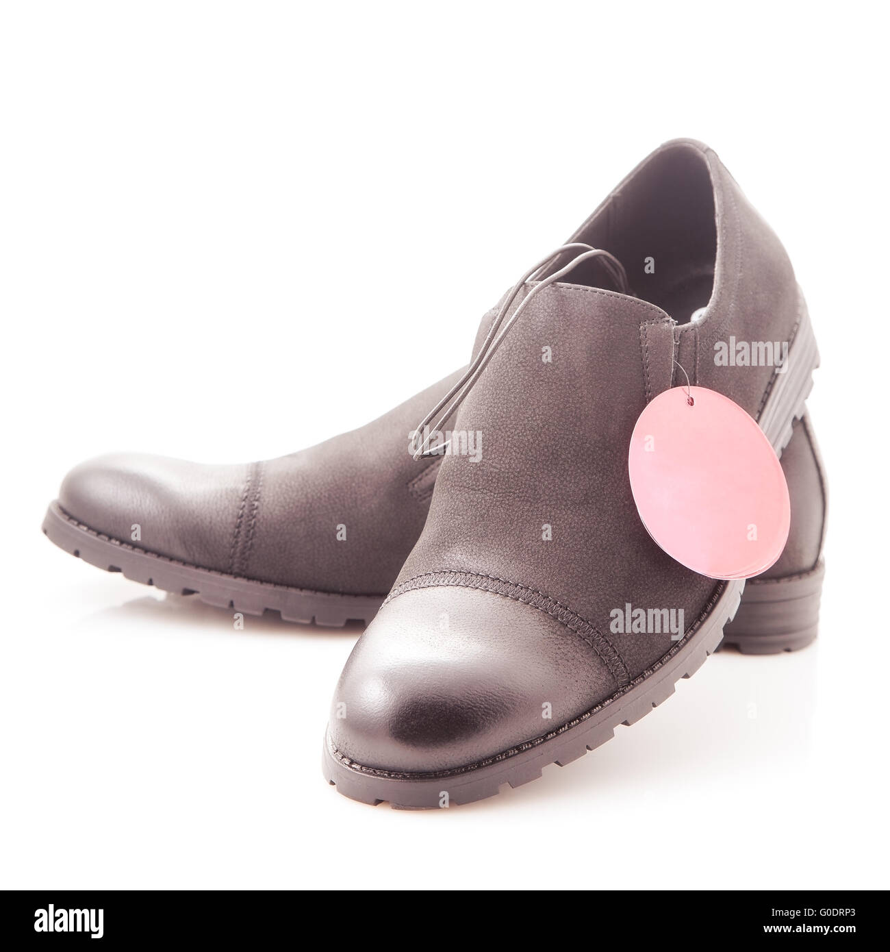 men's dress shoes with red price tag on a white background Stock Photo ...