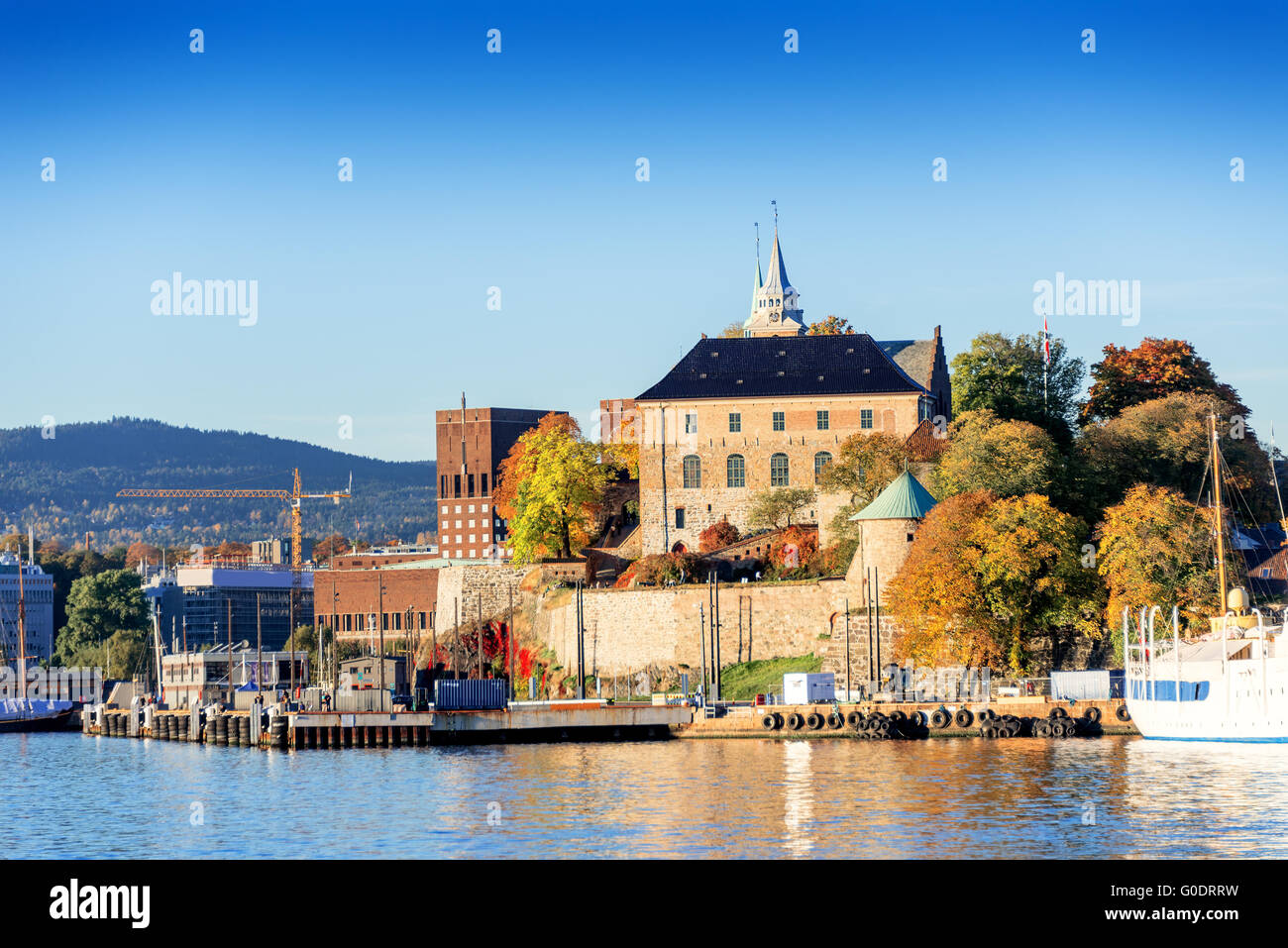 Akershus Fortress at golden hours with Bjorvika Stock Photo - Alamy