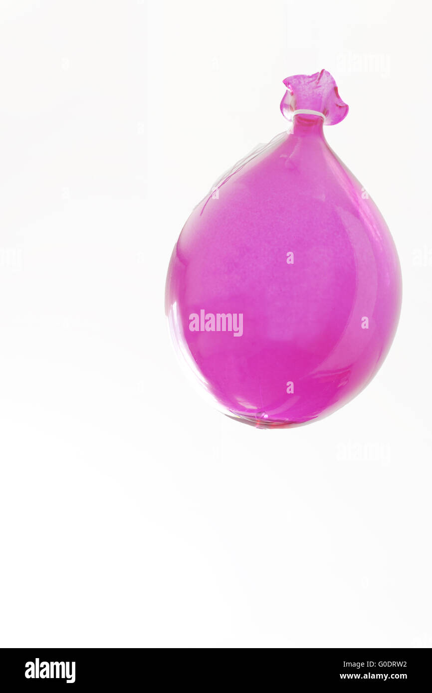 Glass balloon upside down Stock Photo - Alamy