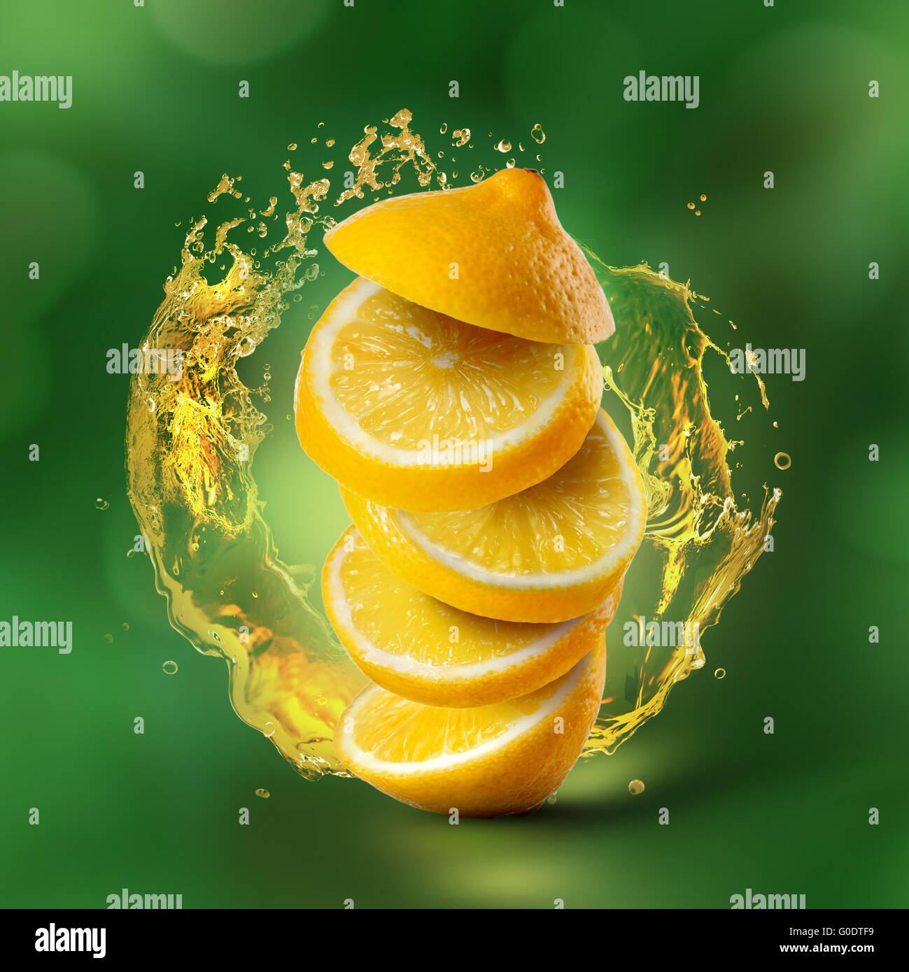 Lemon flying in air with juice splash on green Stock Photo - Alamy
