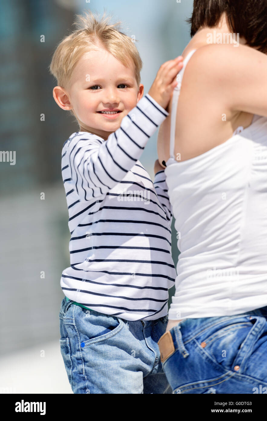 Little preschool boy playing and having fun outdoors Stock Photo - Alamy