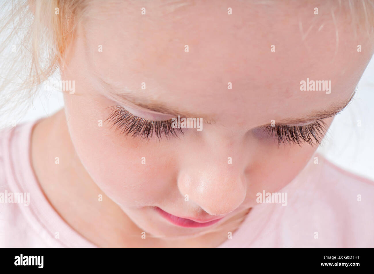 Portrait of cute little girl with long eyelashes Stock Photo - Alamy