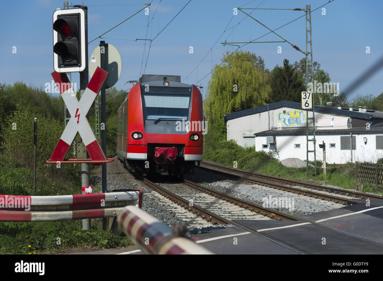 Red passenger train Stock Photo - Alamy