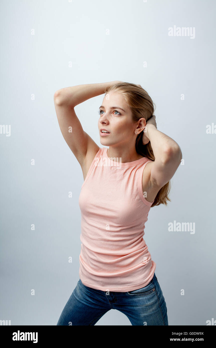 girl with hands over head Stock Photo - Alamy