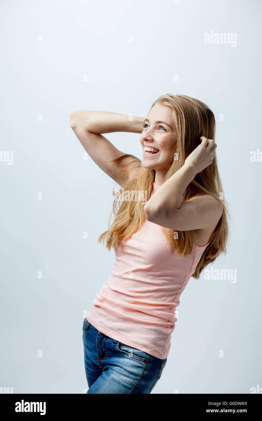 girl with hands over head Stock Photo - Alamy