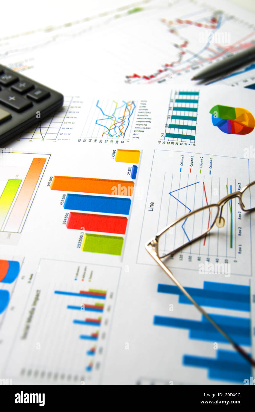 colour printed Financial charts on the table with Stock Photo - Alamy