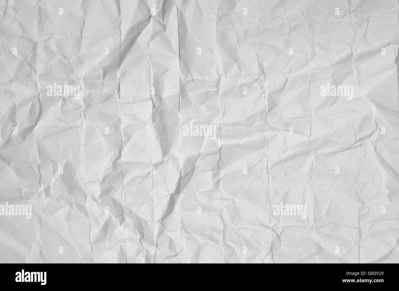 Close up of a creased, white paper texture, full frame, horizontal ...