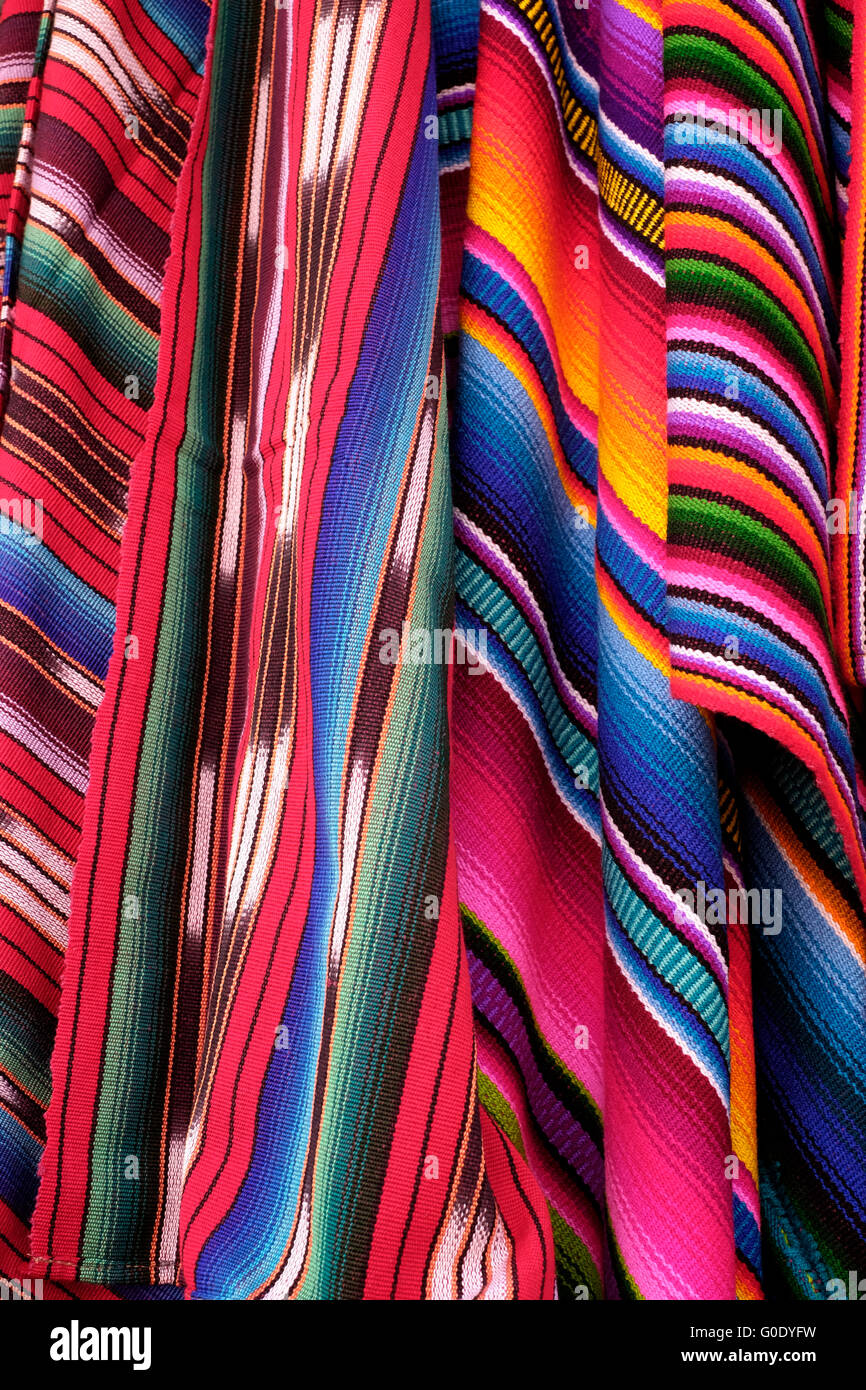 A display of tzutes or traditional utility cloths for sale at the ...