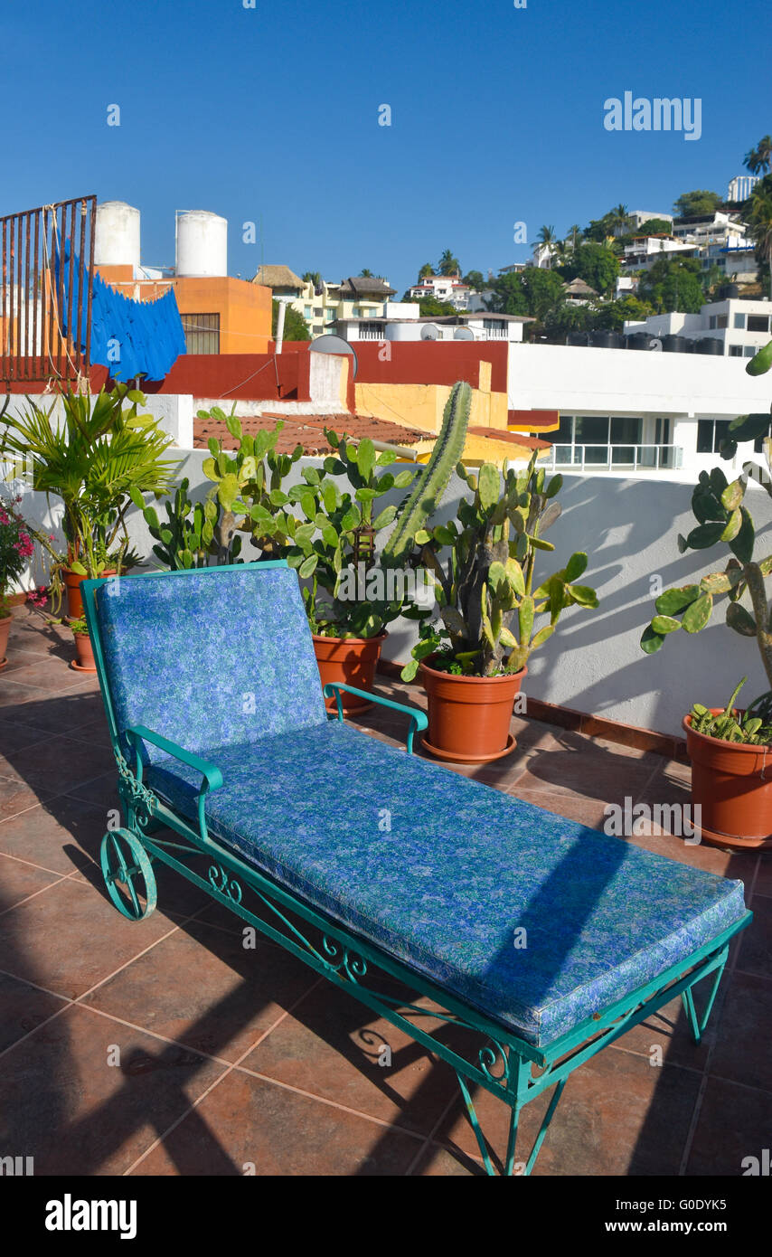 Lawnchair on rooftop in Mexico Stock Photo - Alamy