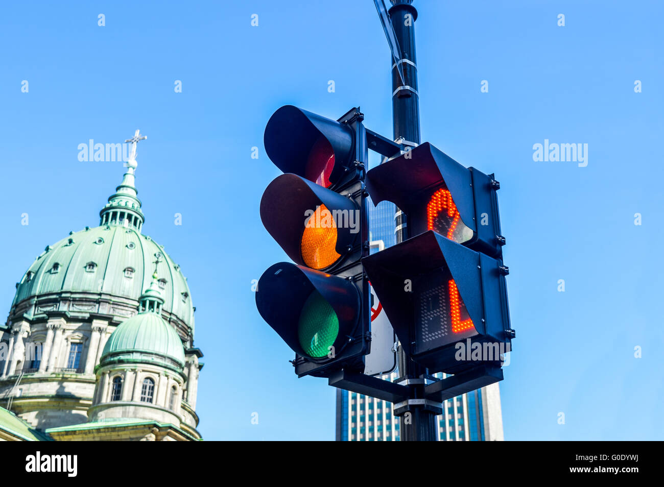 Orange color on the traffic light in Montreal downtown Stock Photo - Alamy