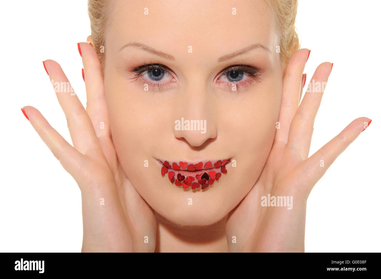 Portrait of beautiful woman with heart on lips Stock Photo - Alamy
