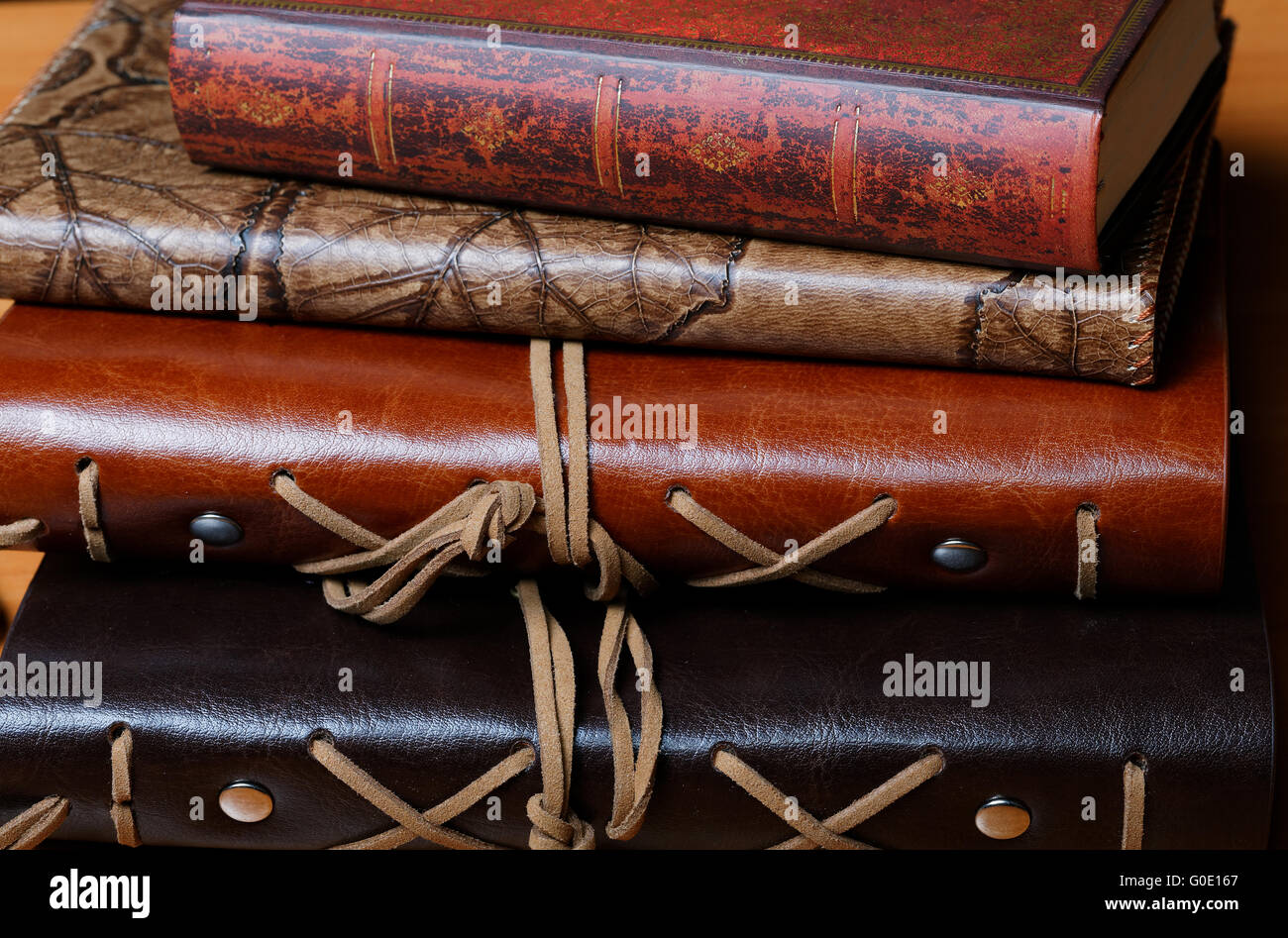 Pile of notebooks in leather covers close up Stock Photo - Alamy
