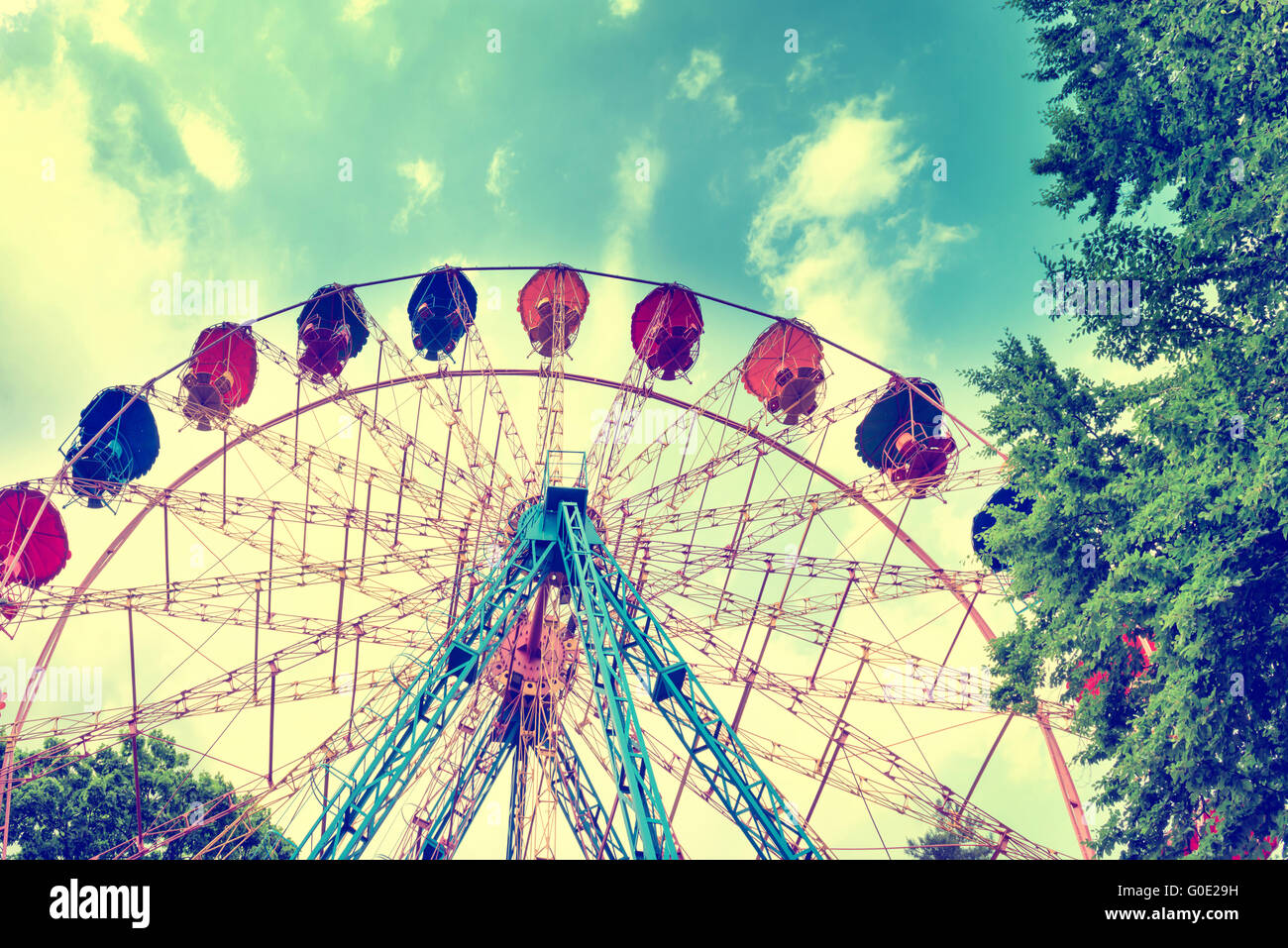 Ferris wheel in the green park Stock Photo - Alamy