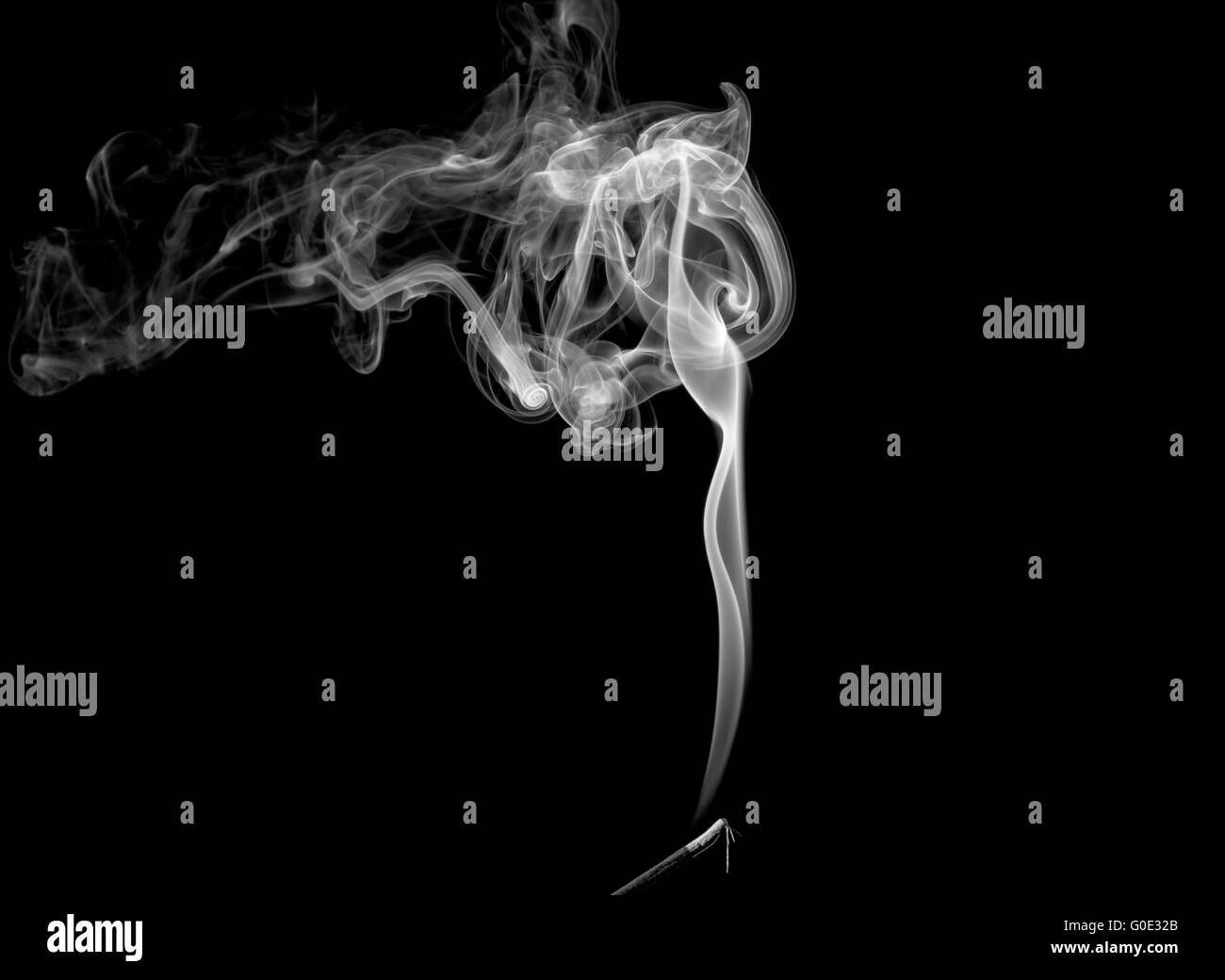 Abstract light smoke on a dark background Stock Photo - Alamy