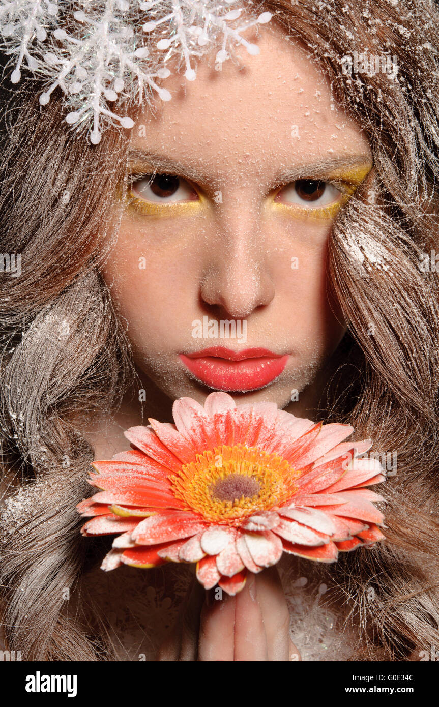 Female face with flower hi-res stock photography and images - Alamy
