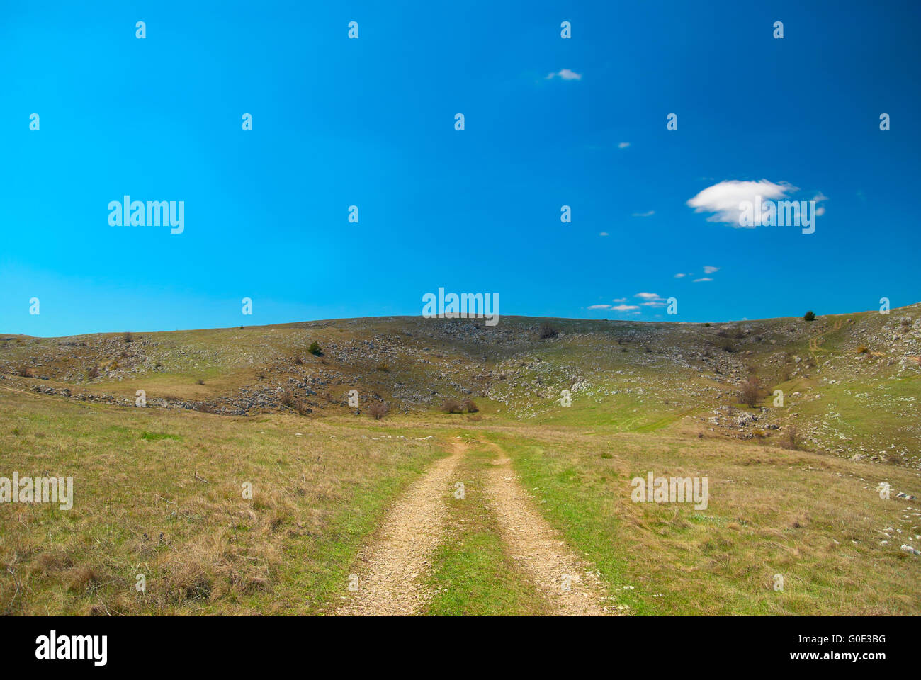 Road over hills hi-res stock photography and images - Alamy