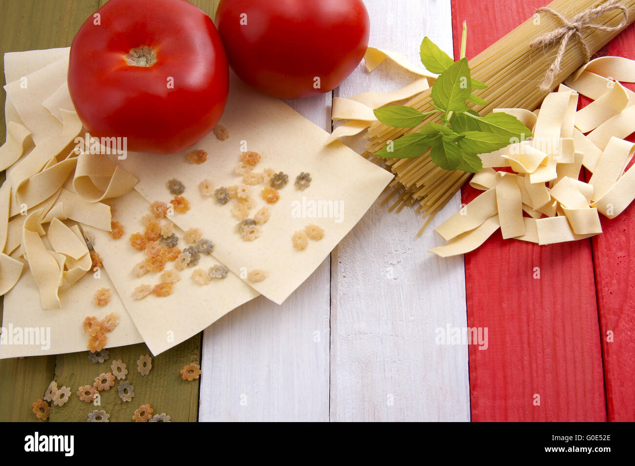 Traditional food on the background of the Italian flag Stock Photo - Alamy