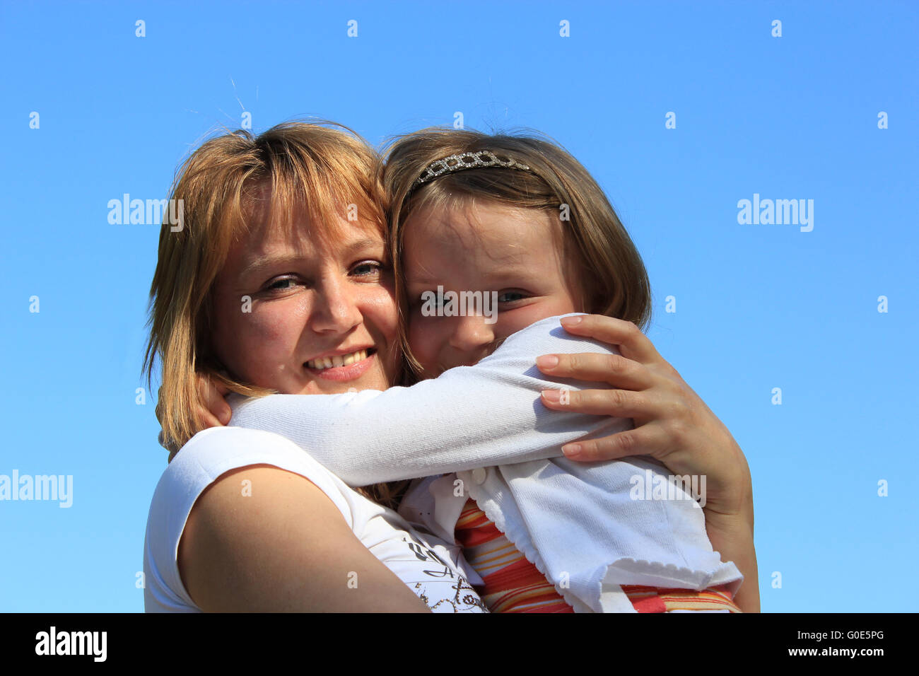 mother and daughter are hugging one another Stock Photo - Alamy