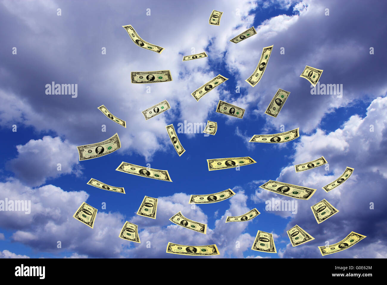dollar banknotes flying away in the sky Stock Photo - Alamy