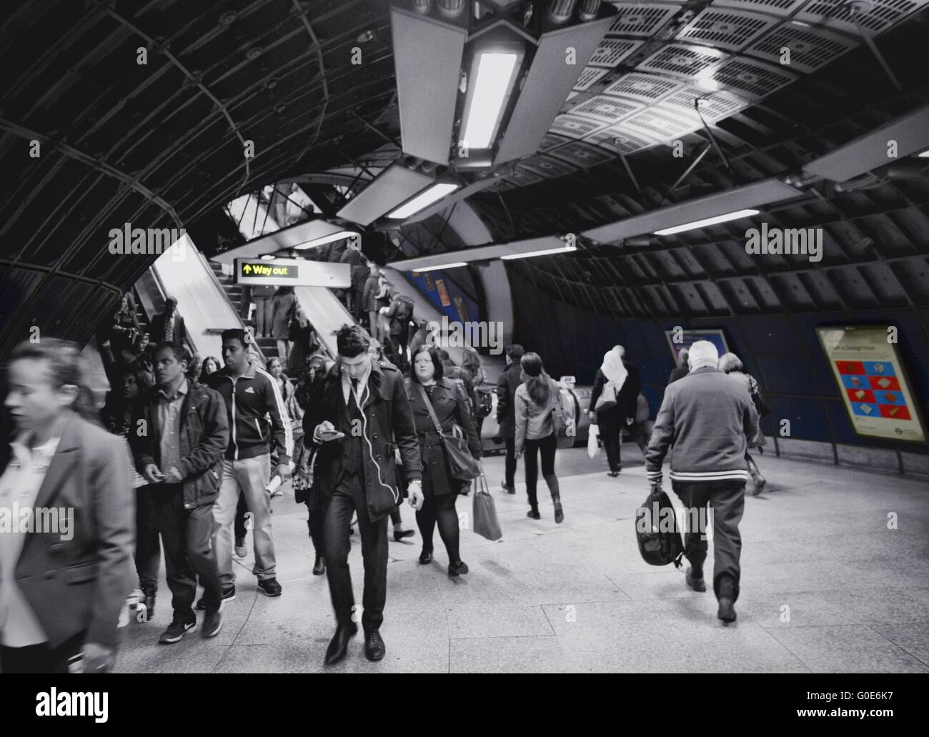People moving between escalators at London Bridge Underground station ...