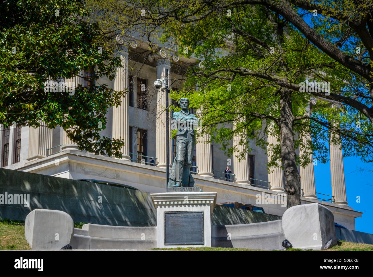 Spring blooms on trees surround Sam Davis statue before the shrouded ...