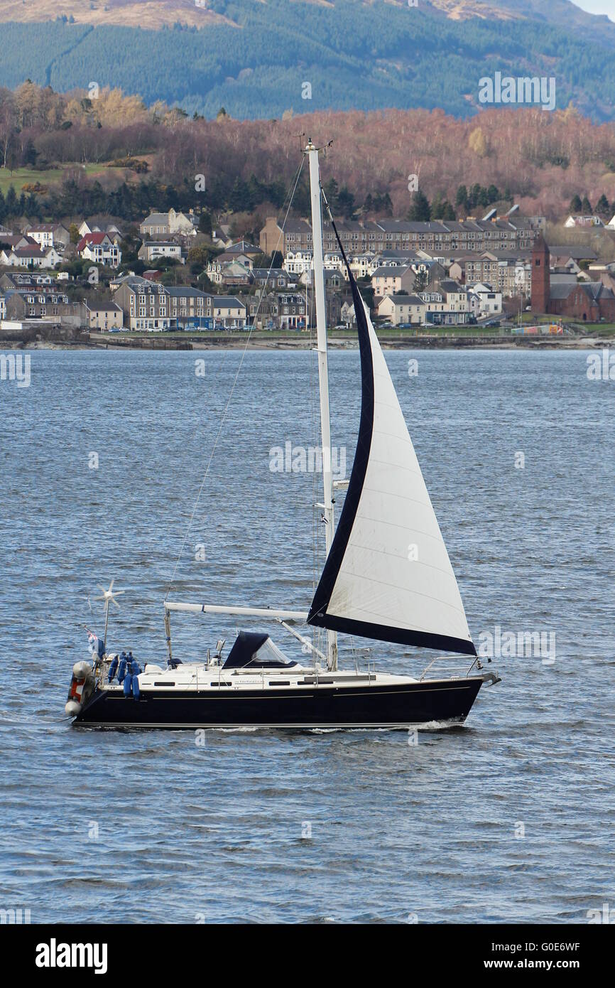 The yacht Schiehallion passing Cloch Point on the Firth of Clyde Stock ...
