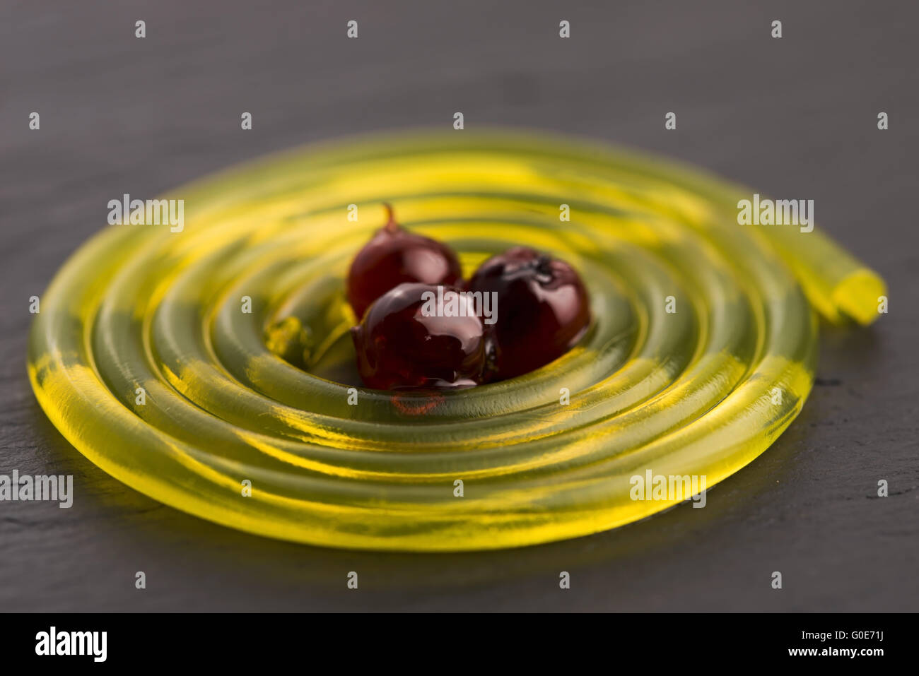 molecular fruit spaghetti with rowan in syrup Stock Photo - Alamy