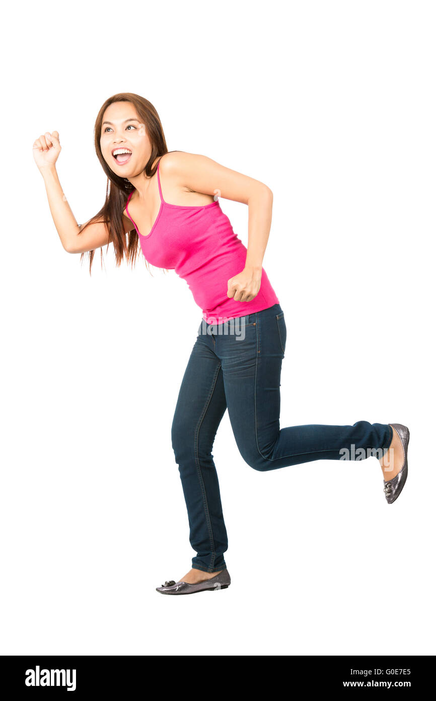 Excited Asian Girl Chasing Something Off-Screen Stock Photo - Alamy
