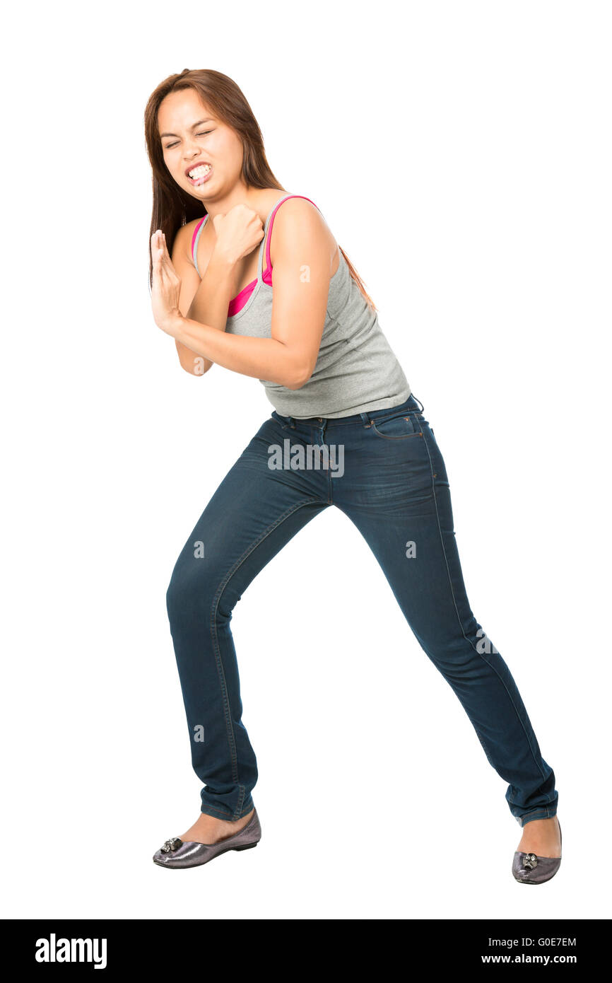 Straining Woman Leaning Shoulder Against Object Stock Photo - Alamy