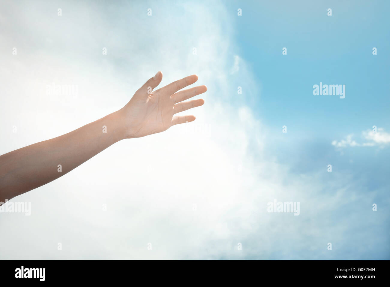 Hand on a sky Stock Photo - Alamy