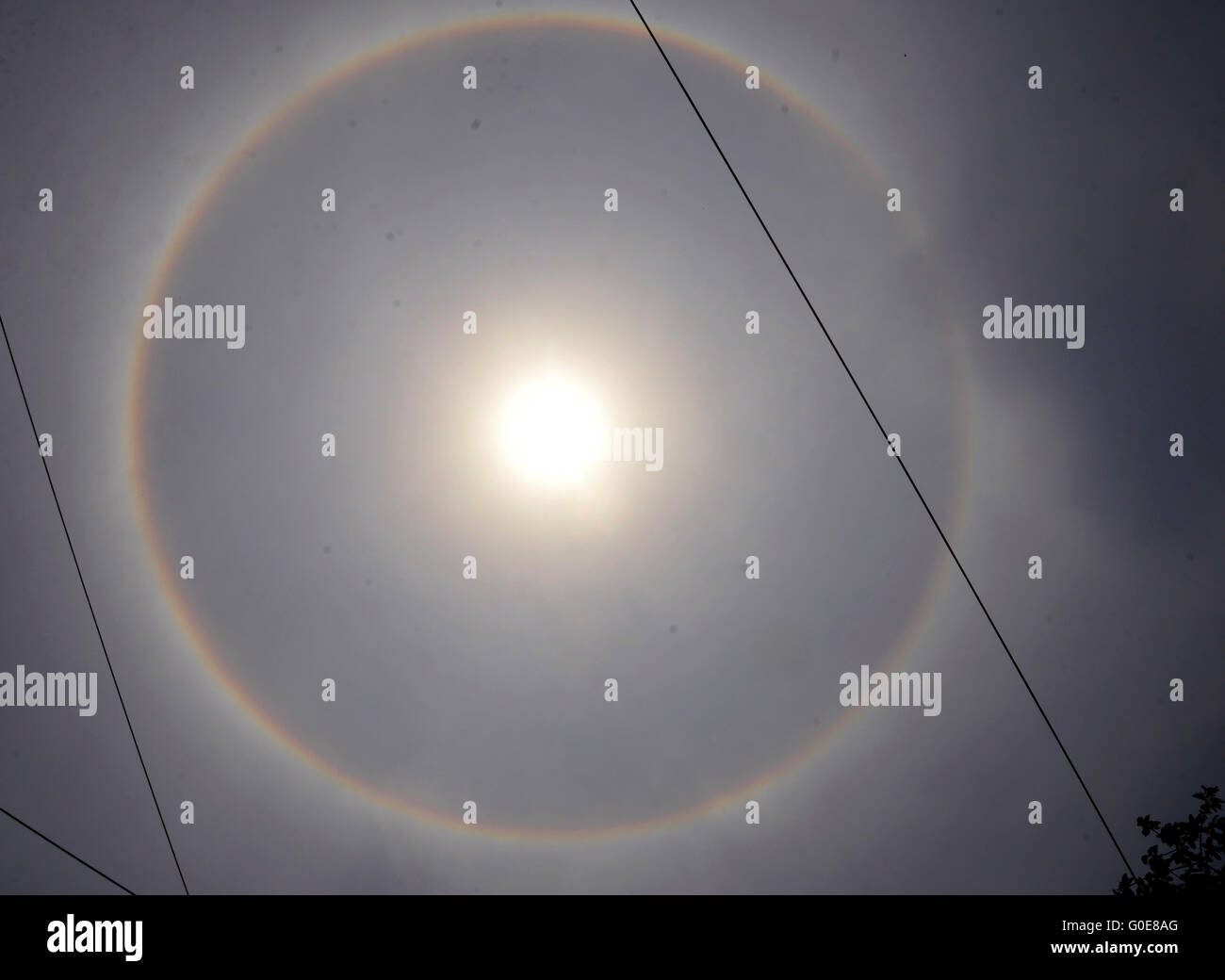 Kolkata, India. 30th Apr, 2016. The sun with rainbow ring seen in ...