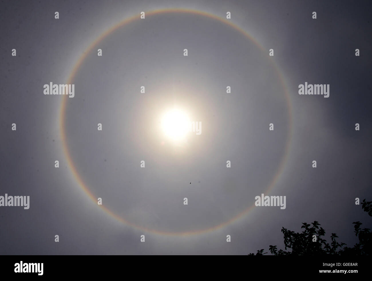 Kolkata, India. 30th Apr, 2016. The sun with rainbow ring seen in ...