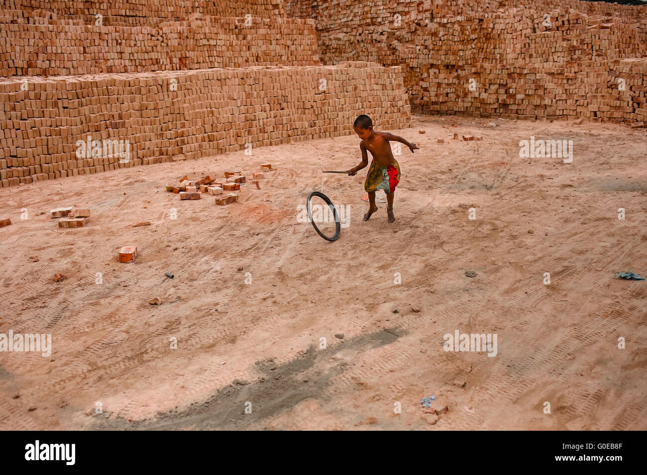 Poor children playing in yard hi-res stock photography and images - Alamy