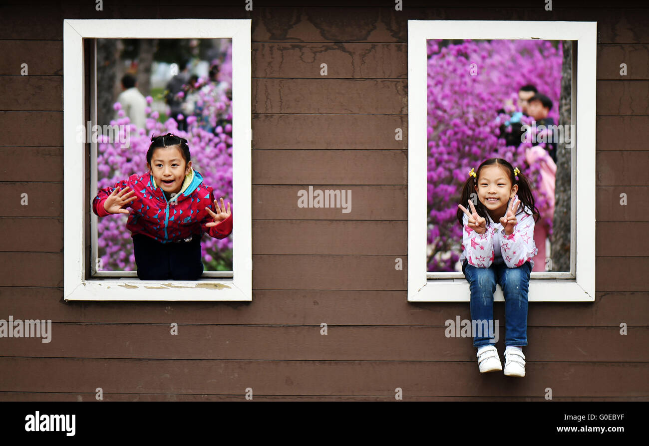 Harbin, China's Heilongjiang Province. 1st May, 2016. Young girls pose ...